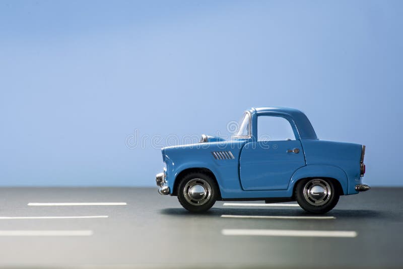 Blue Toy Car on a Blue Background Stock Image - Image of land, dark ...