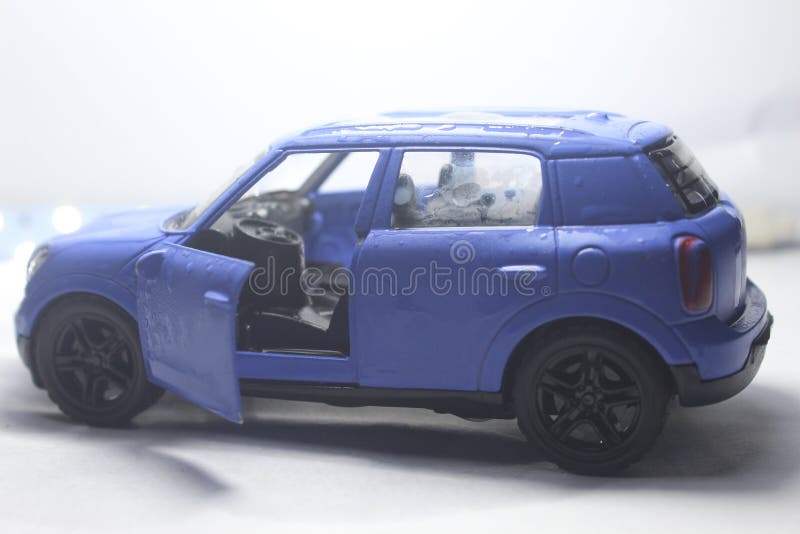 Blue toy car in the glow stock image. Image of wheel - 255321791