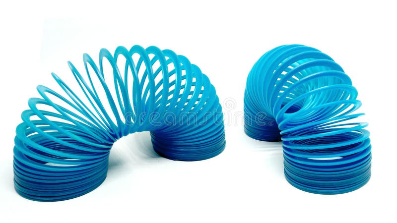 Blue Flexible Slinky Spring Editorial Photography - Image of abstract ...