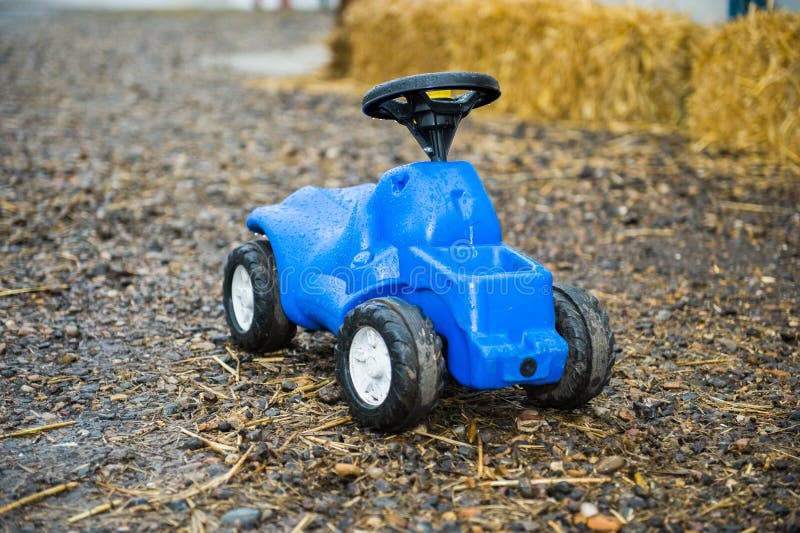 Blue toy tractor stock image. Image of royalty, photographs - 63149847