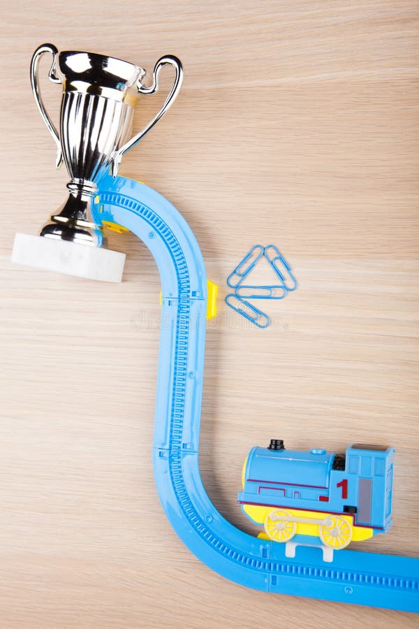 Blue Toy Train Gold Cup Table Internet Icon Scraper Stock Photo - Image ...