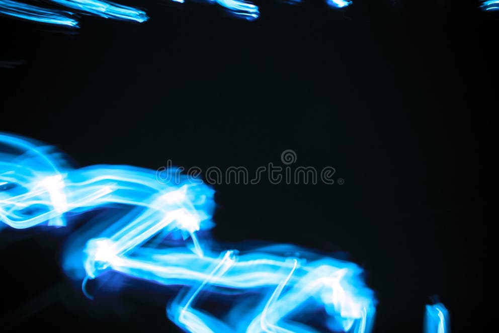 Blue Trace of Light on a Black Background Stock Image - Image of ...