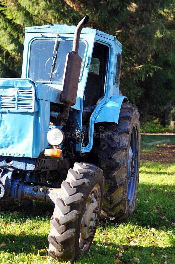 Blue tractor stock photo. Image of machinery, object - 21582756