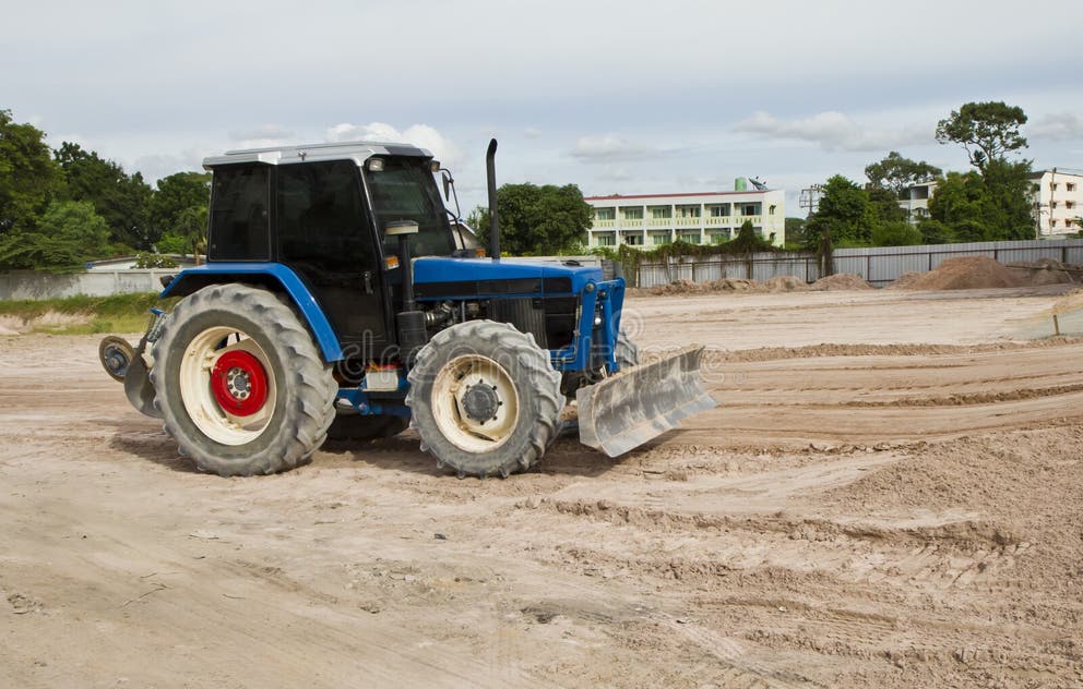 Blue tractor. stock photo. Image of office, tractors - 26652272