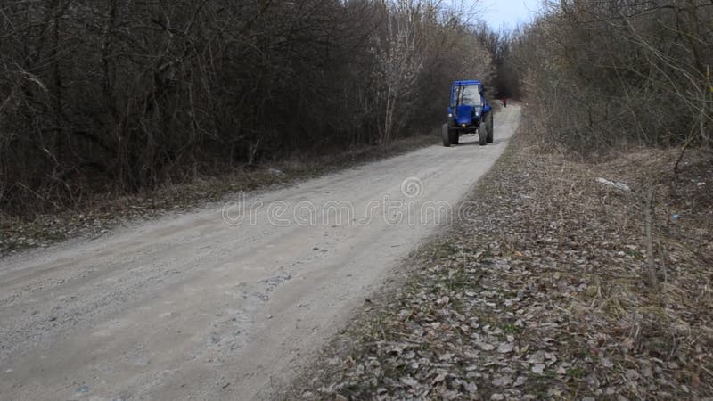 Big Blue Tractor Front View. Close Up of Agricultural Machine Stock ...