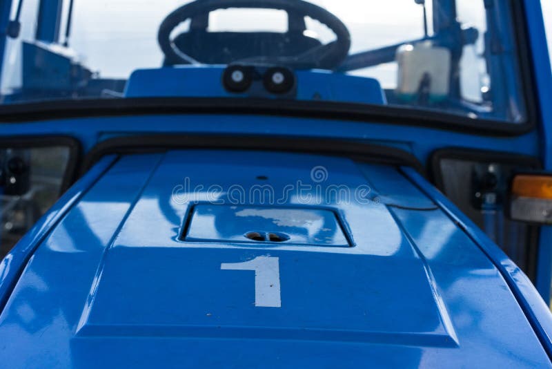 Blue Tractor Cabin Front View with Number One Stock Photo - Image of ...