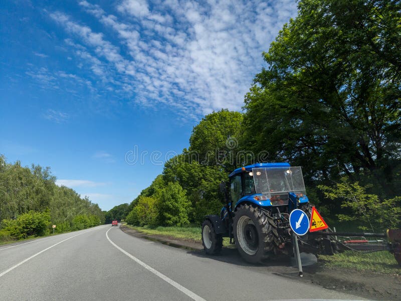 A Car is Driving Down a Road with Its Roof Extended Stock Image - Image ...