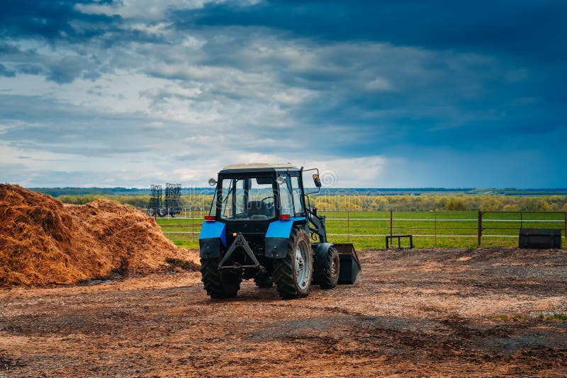 Blue Tractor on a Large Farm. the Equipment for Successful Work in ...