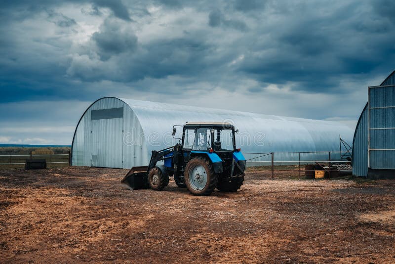 Blue Tractor on a Large Farm. the Equipment for Successful Work in ...