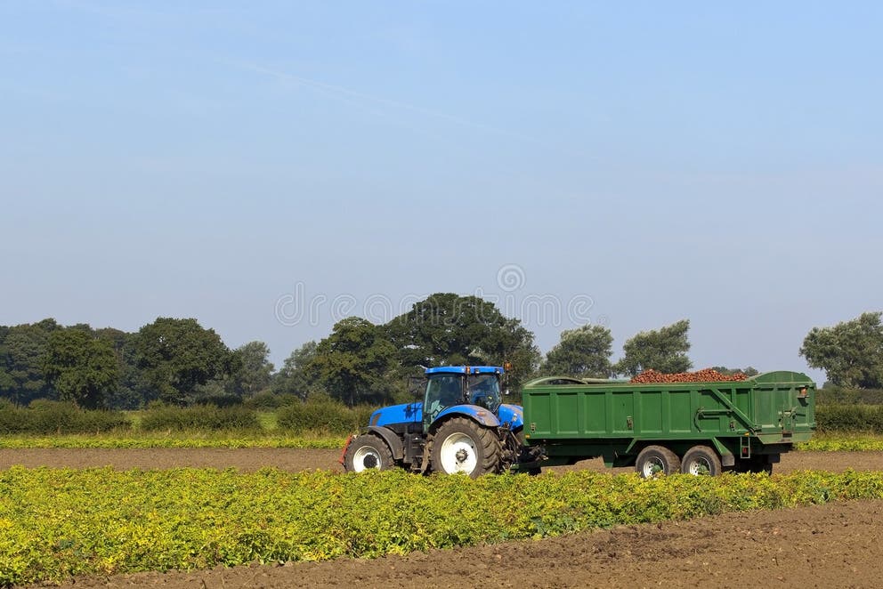 Blue tractor and trailer stock image. Image of fields - 15876573
