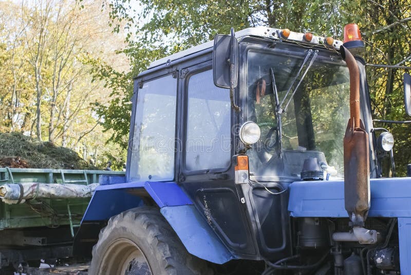 Blue tractor and trailer stock image. Image of farming - 15876573