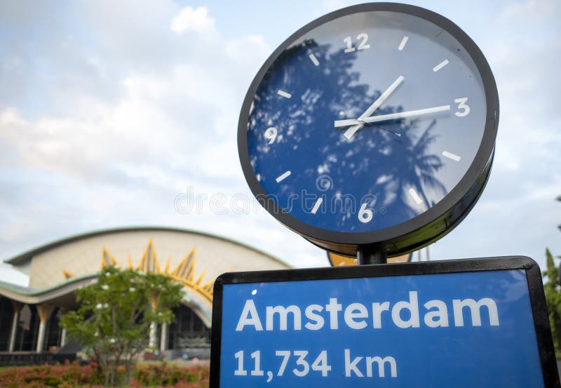 A Blue Traffic Sign Board of Amsterdam and a Blue Public Clock, 11754 ...