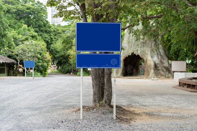Blue Traffic Sign in Paking Lots with Tree Around. Clipping Paths Stock ...