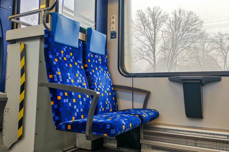 Modern Train Seats with Patterned Material in a Hungarian Railway Car ...