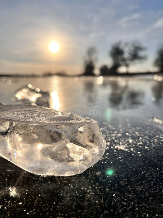 Ice at sunset stock photo. Image of evening, wave, cloud - 275349436