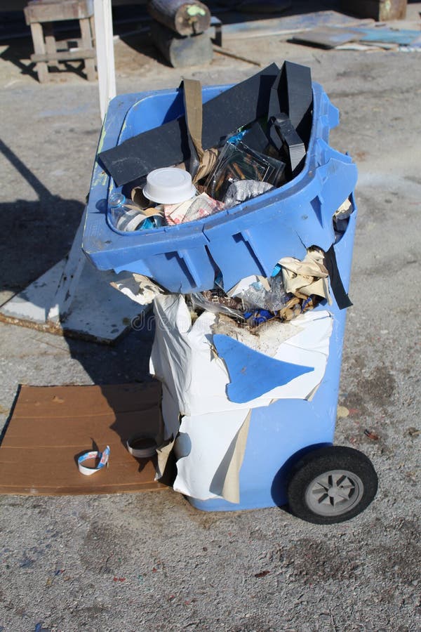 A Blue Trash Bin Full of Trash and Plastic for Recycle Stock Image ...