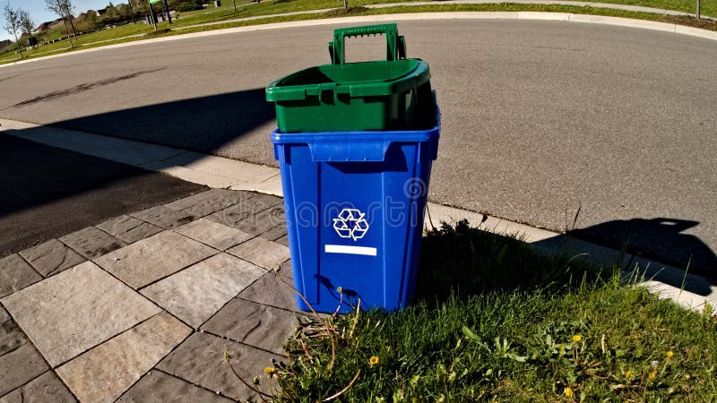Blue Trash Can on Roadside in Toronto Stock Photo - Image of recycling ...