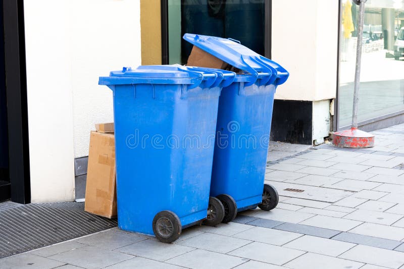 Blue Trash Can at Side Walk in Munich Stock Photo - Image of dumpster ...