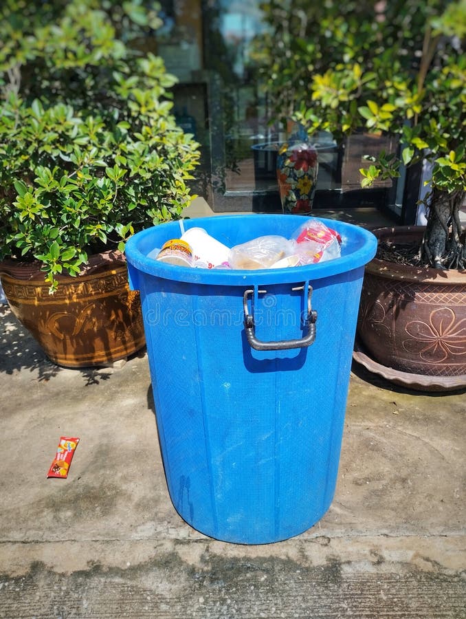 Blue Trash Bin Full of Garbage Plastic Waste Trash. Trash Plastic ...