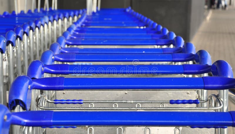Blue trolleys stock image. Image of shop, shopping, modern - 36099041