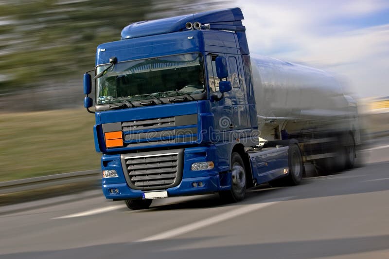 Blue Truck Driving Fast stock photo. Image of service - 7979666