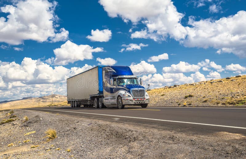 Blue Truck Moving on a Highway Stock Photo - Image of moving, container ...