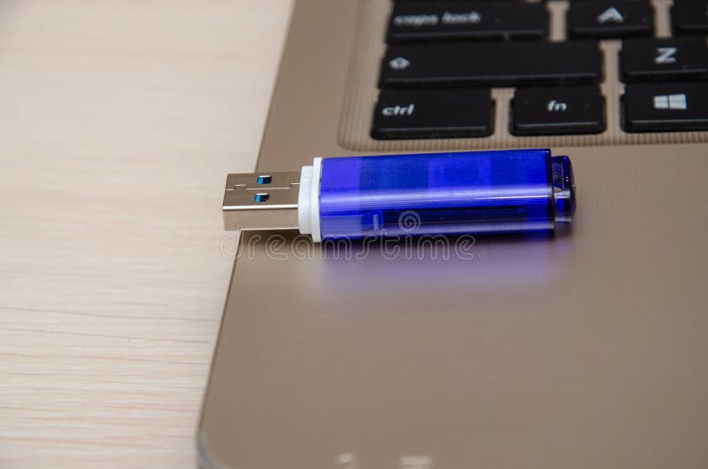 Blue USB Flash Drive or Connected To Laptop Computer`s USB Port ...