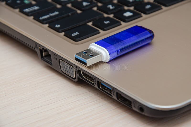Blue USB Flash Drive or Connected To Laptop Computer S USB Port ...