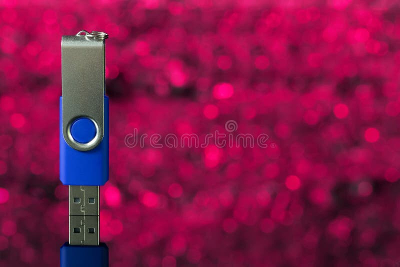 Blue USB Flash Drive on Pink Background Out of Focus Stock Photo ...