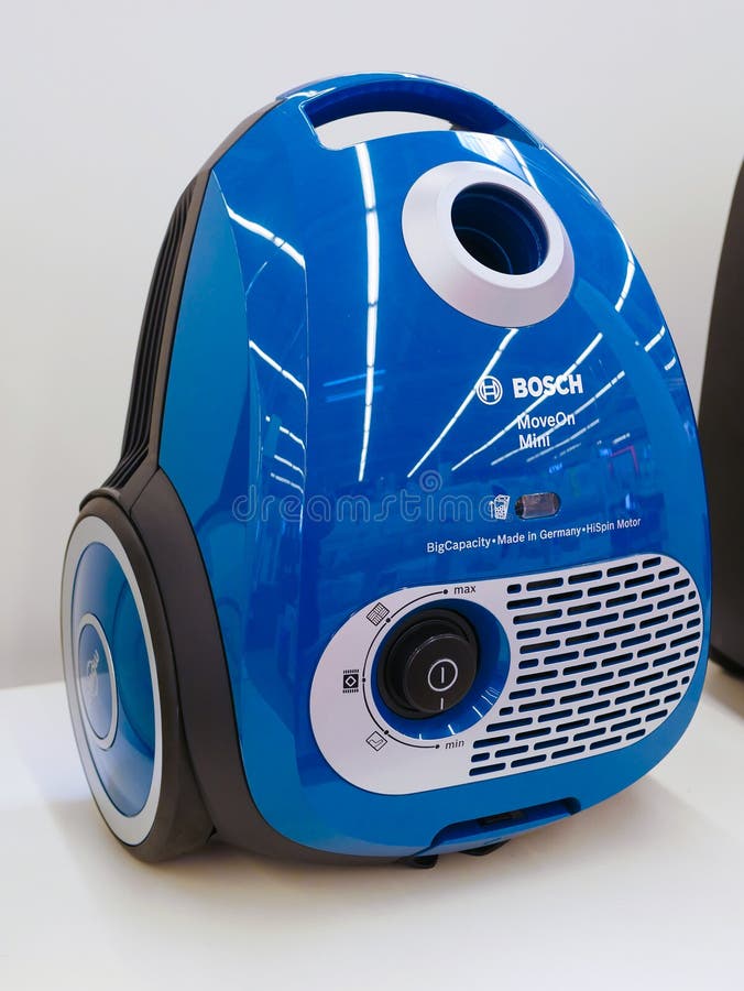 Blue Vacuum Cleaner. at the Store Counter Editorial Photography - Image ...