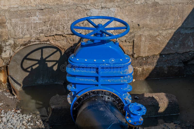 Blue Valve Close-up on the Drain Tube in the Well Stock Image - Image ...