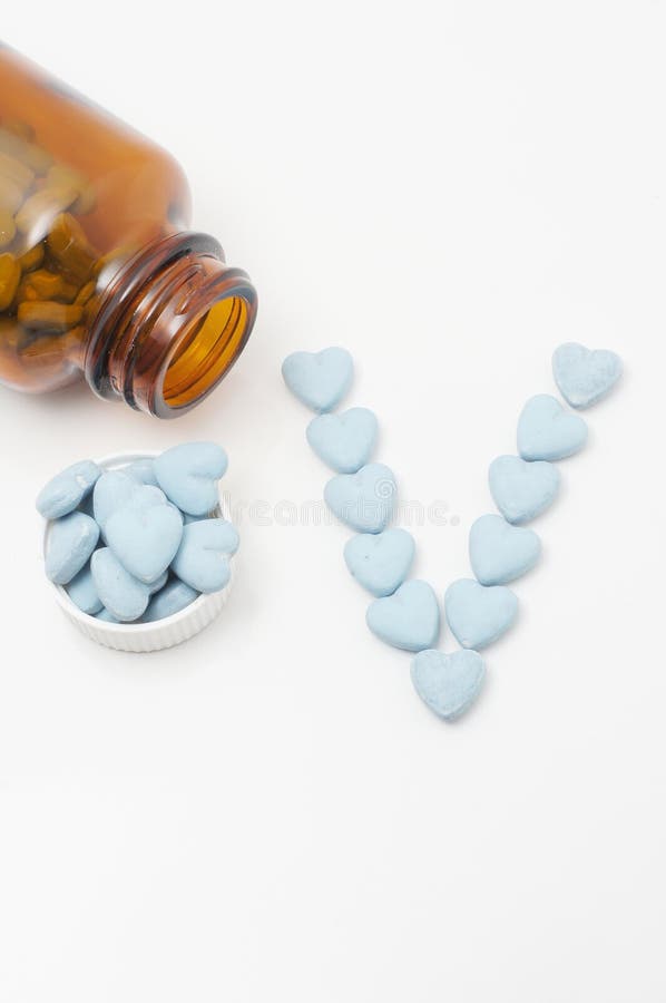 Blue vitamins with bottle stock image. Image of care - 31555001
