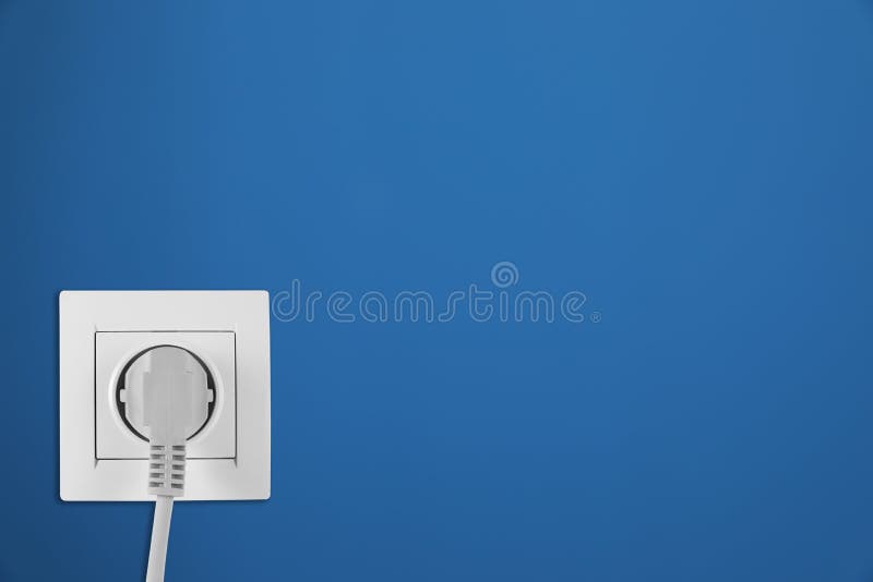 Blue Wall with Power Socket and Inserted Plug. Electrical Supply Stock ...