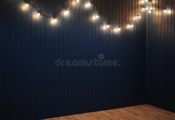 Blue Wall with Retro Garland of Light Bulbs. Texture for the Design ...