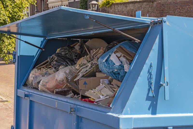 Blue Waste Container with Open Flap Stock Photo - Image of full ...