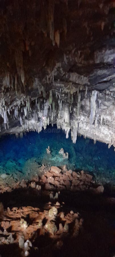 The Blue Water in the Cave Also Follows the Tides Stock Photo - Image ...