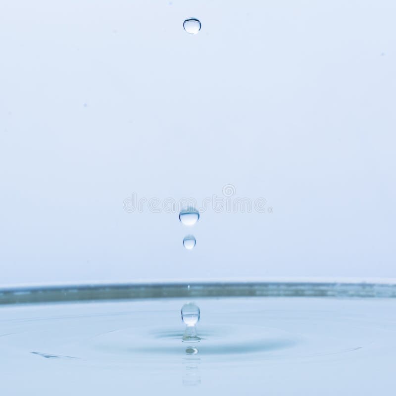 Blue Water Drop Falling Down Stock Photo - Image of splash, drop: 69127804