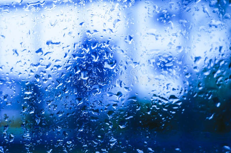 Blue Water Drops on the Glass after Raining Stock Image - Image of ...