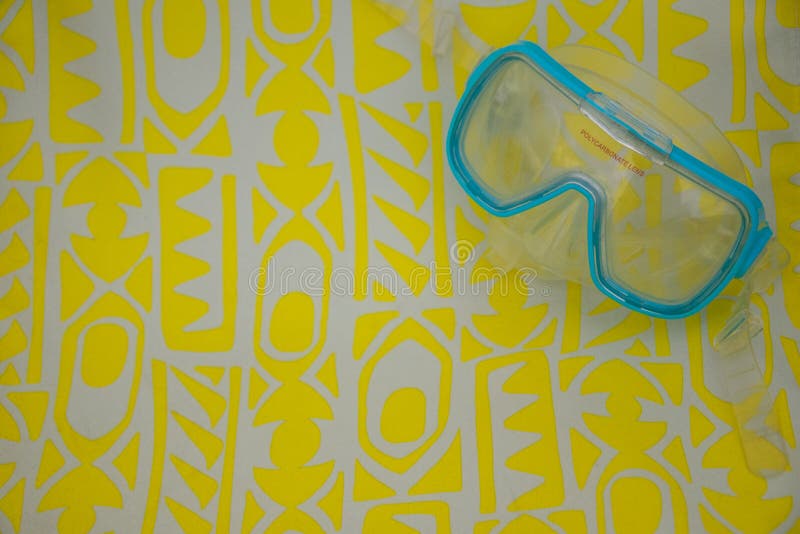 Blue Water Mask on Pattern Yellow Paper Stock Photo - Image of color ...