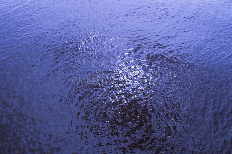 Blue Water with Ripples and Sun Flare Stock Photo - Image of water ...