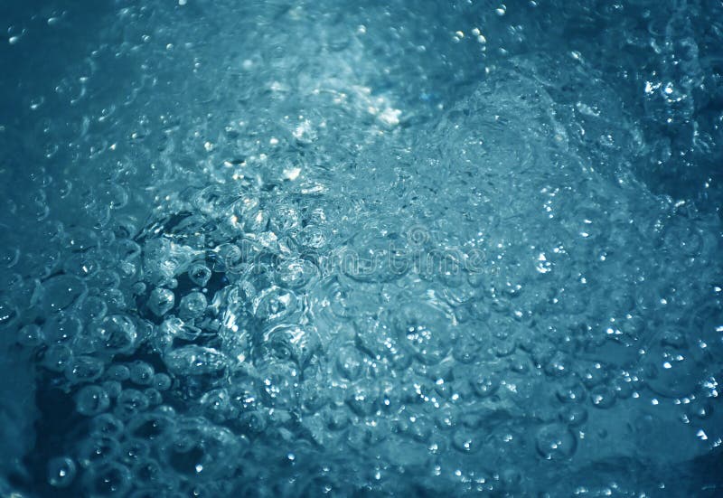 The Blue Water Surface Bubbling into a Beautiful Grain Stock Photo ...