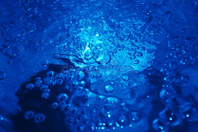 The Blue Water Surface Bubbling into a Beautiful Grain Stock Photo ...