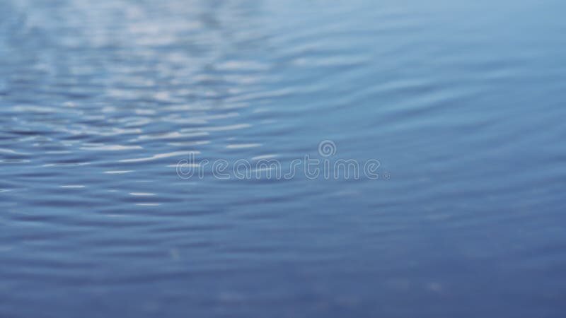 Blue Water Surface Creating Ripples from the Wind Stock Footage - Video ...