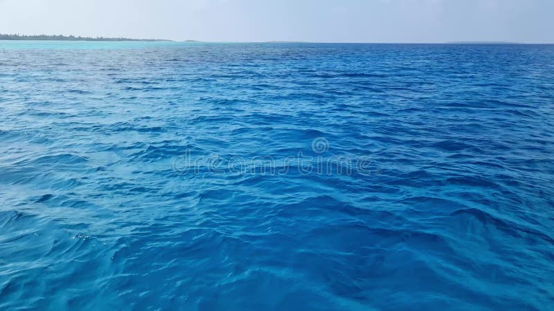 The Blue Water Surface of the Indian Ocean Off the Maldives Stock ...