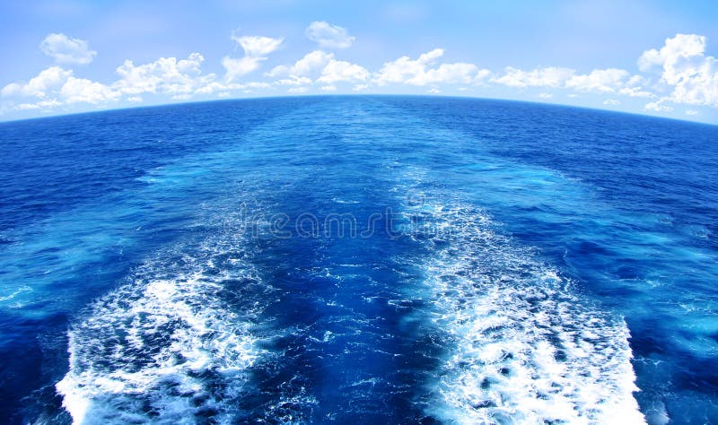 Blue Water Wake Pattern Behind Marine Vessel Stock Image - Image of ...