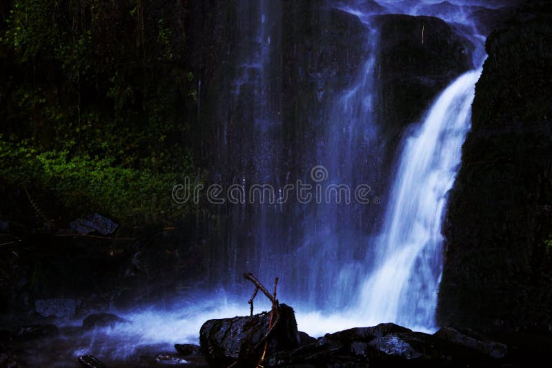 Blue waterfall stock photo. Image of blue, sunlit, angle - 92697484