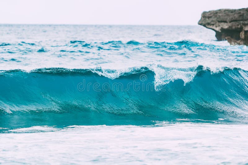 Blue Wave in Ocean. Wave and Rocks Stock Photo - Image of landscape ...