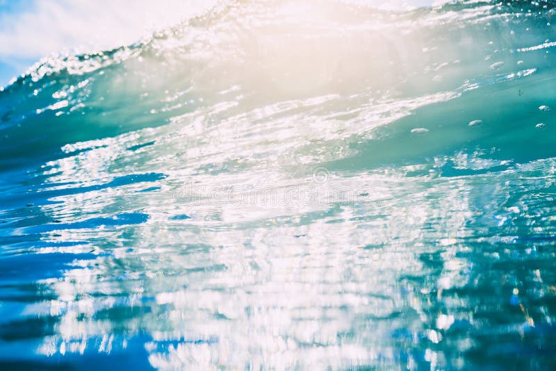Blue Wave in Ocean. Sun Light, Bokeh Background Stock Photo - Image of ...