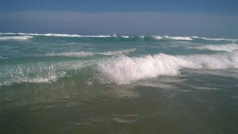 Wild water on the beach stock image. Image of dreamlike - 195358961