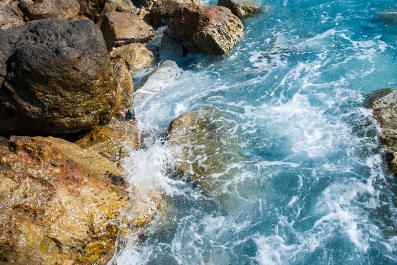 Blue Waves Break on the Rocks of the Shore Stock Photo - Image of rough ...